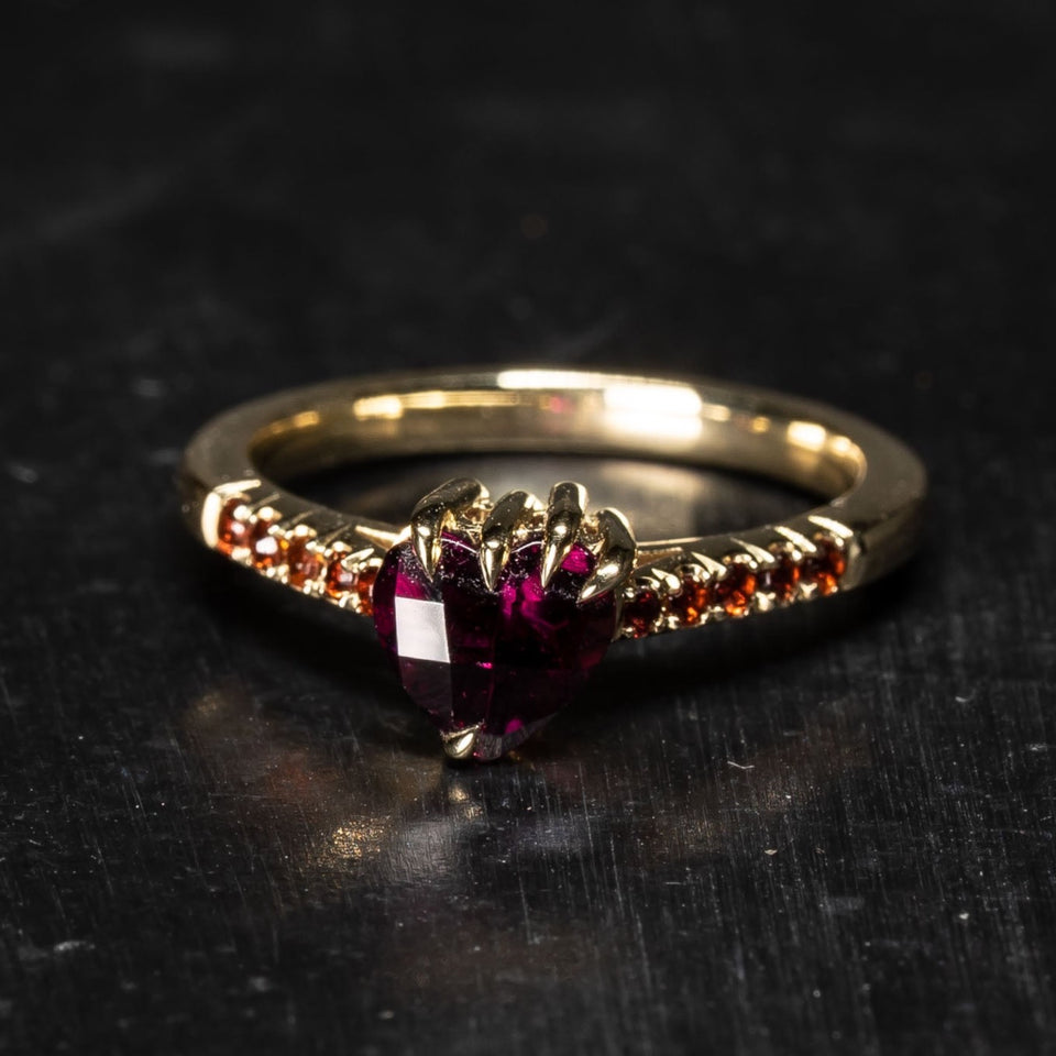 Death Grip Heart in Garnet Ring – Bonearrow